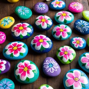 66 Beautiful Flower Painted Rock Ideas for Creative Crafts - Living Tickled